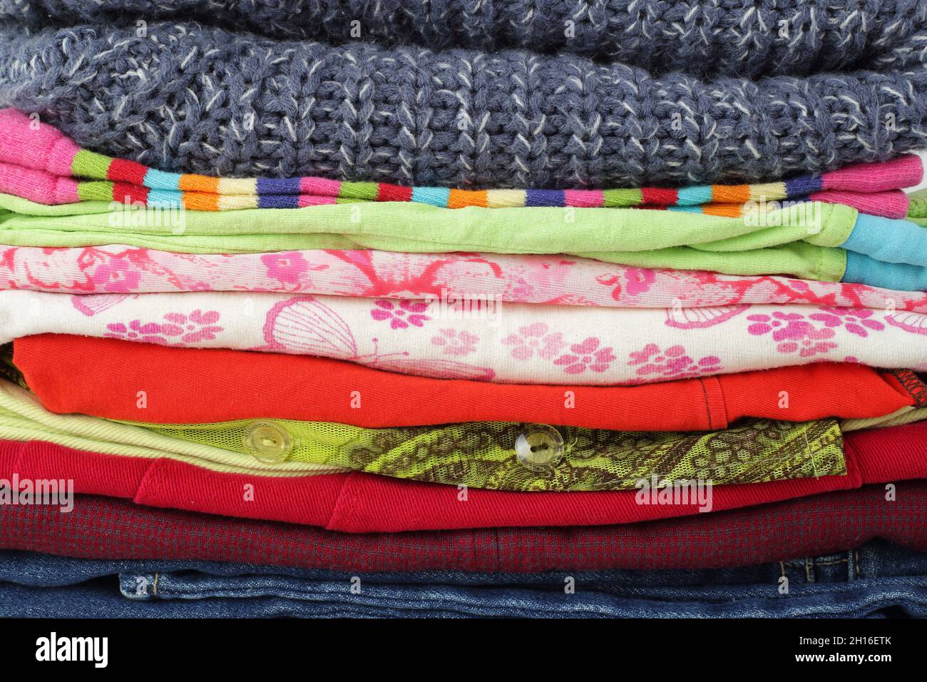 Clothes, shoes and accessories - closeup group stack pile different ...