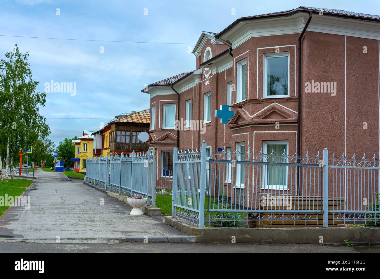 Old houses on the main street of the city of Guryevsk, Kemerovo region ...