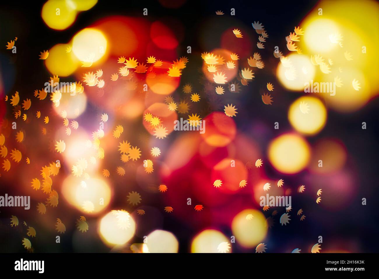 Holiday Christmas glowing color lights with sparkles, blurred bright Christmas abstract bokeh ...