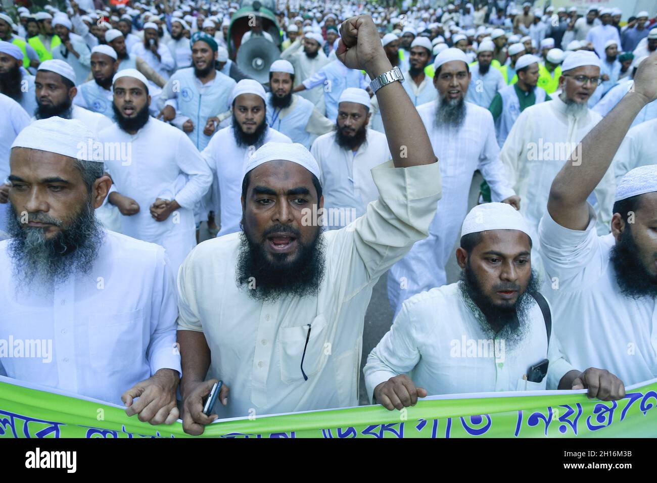 Members of the Islamist party Islami Andolan Bangladesh protest against ...