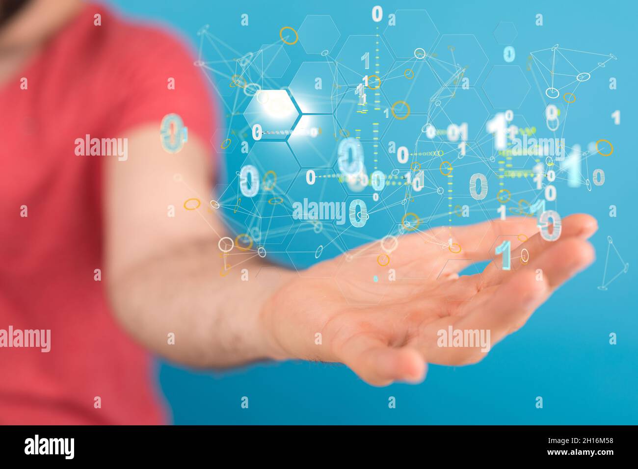 A person presenting the virtual projection of digital binary codes ...