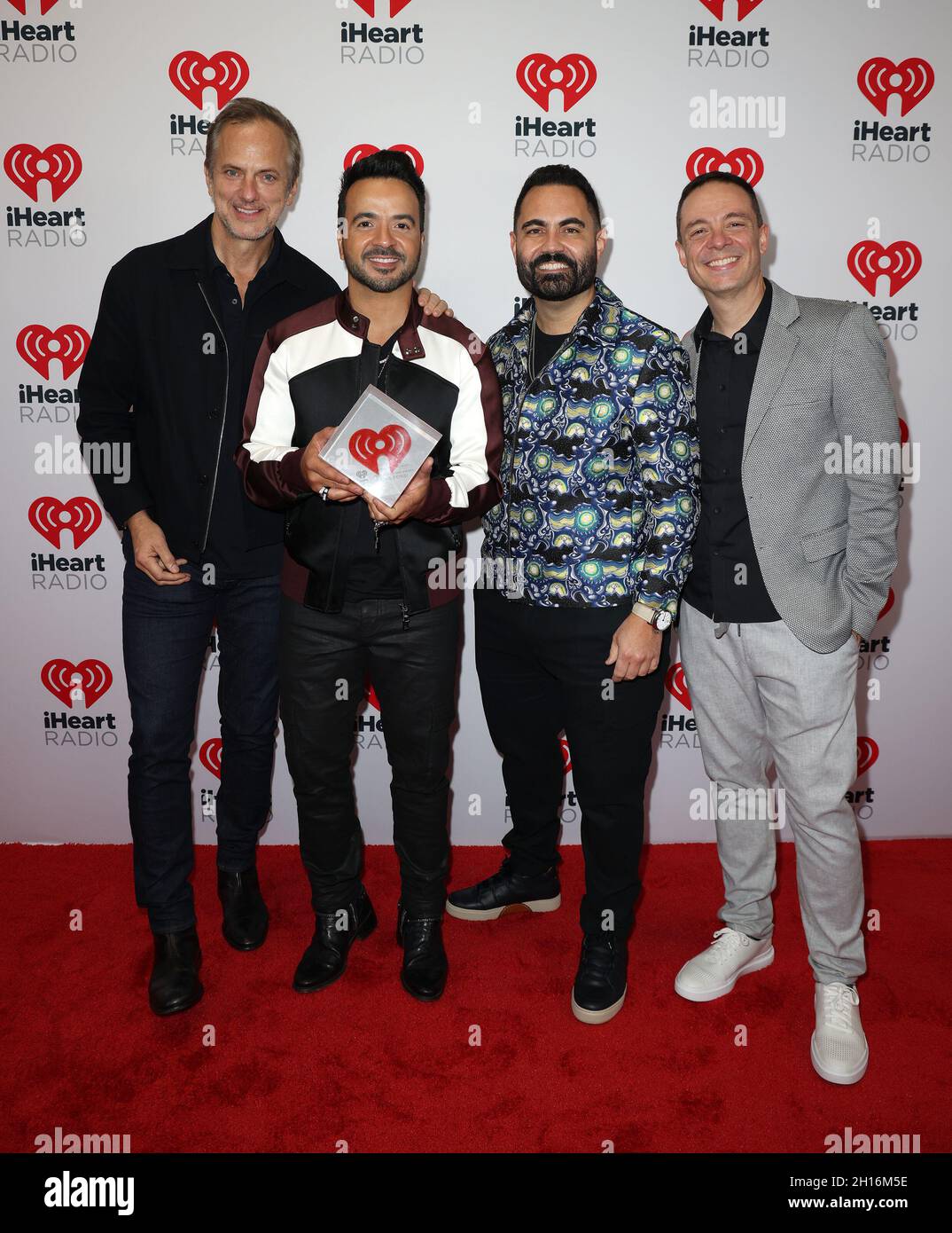 ORLANDO, FLORIDA - OCTOBER 16: (L-R) Tom Poleman, Luis Fonsi and ...