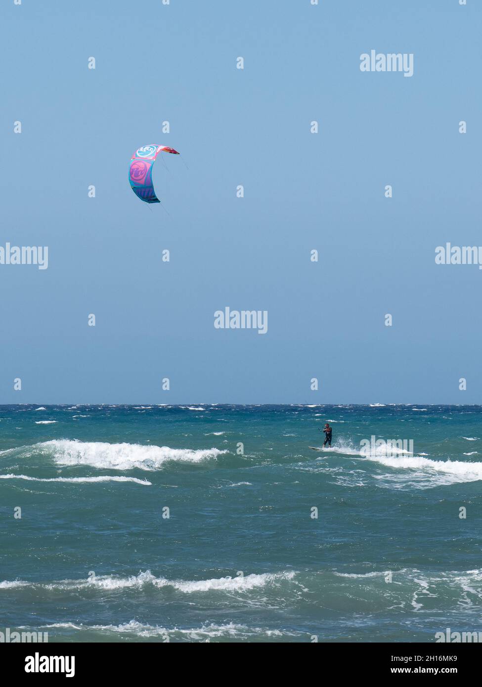 Kitesurfing During a Windy Day with a Very Rough Sea Stock Photo - Alamy