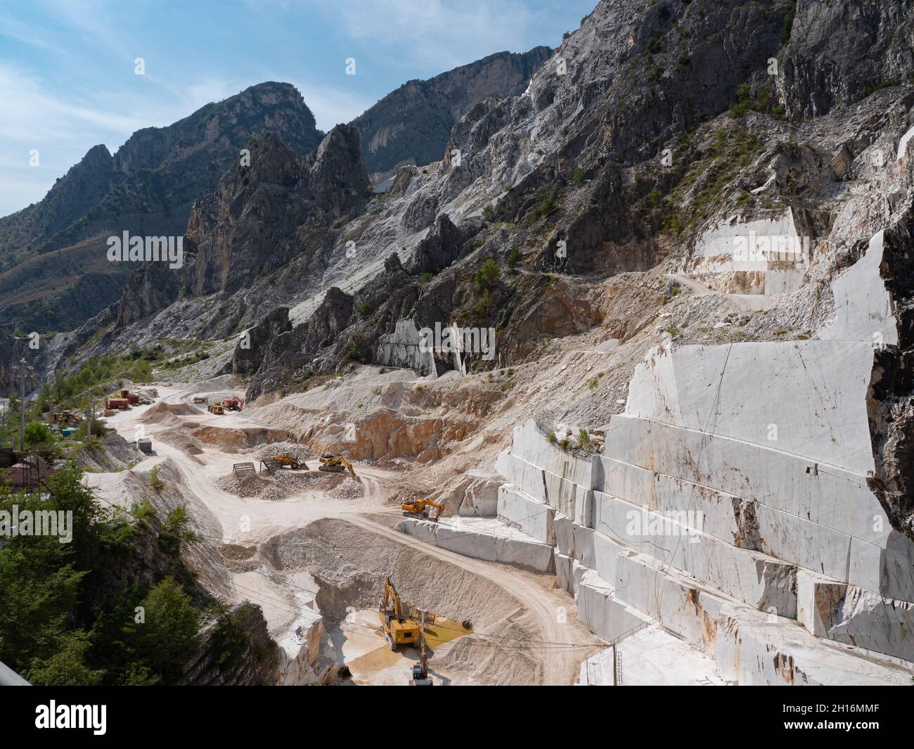 View of the Carrara Marble Quarries with Excavation Vehicles ready for ...