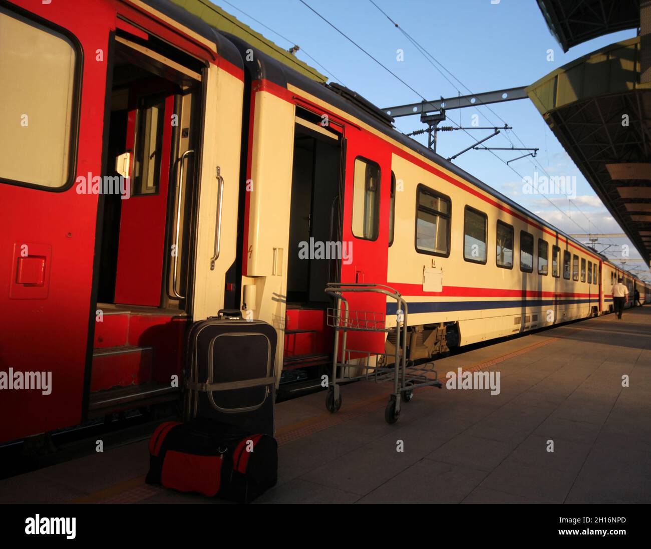 Bags and suitcases at the train station Stock Photo - Alamy