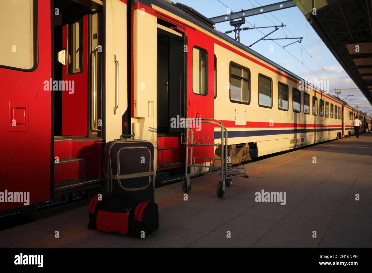 Bags and suitcases at the train station Stock Photo - Alamy