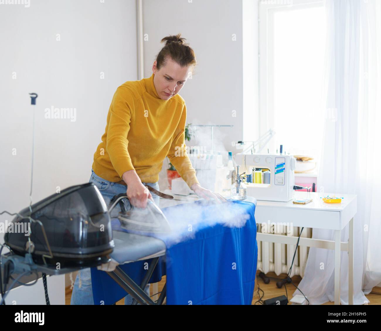 Ironing process hi-res stock photography and images - Alamy