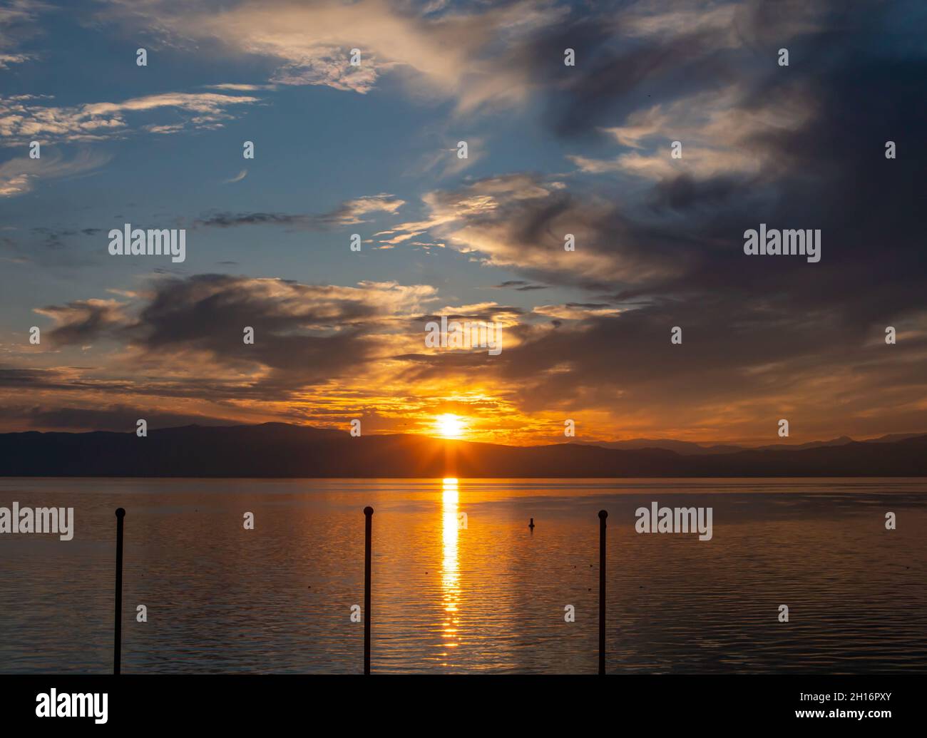 Beautiful calm lake with sunset, natural background Stock Photo - Alamy