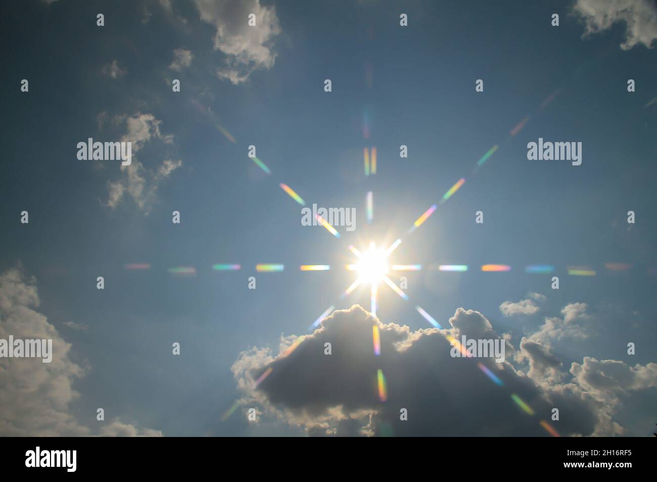 natural clouds blue sky sun ray light Stock Photo - Alamy