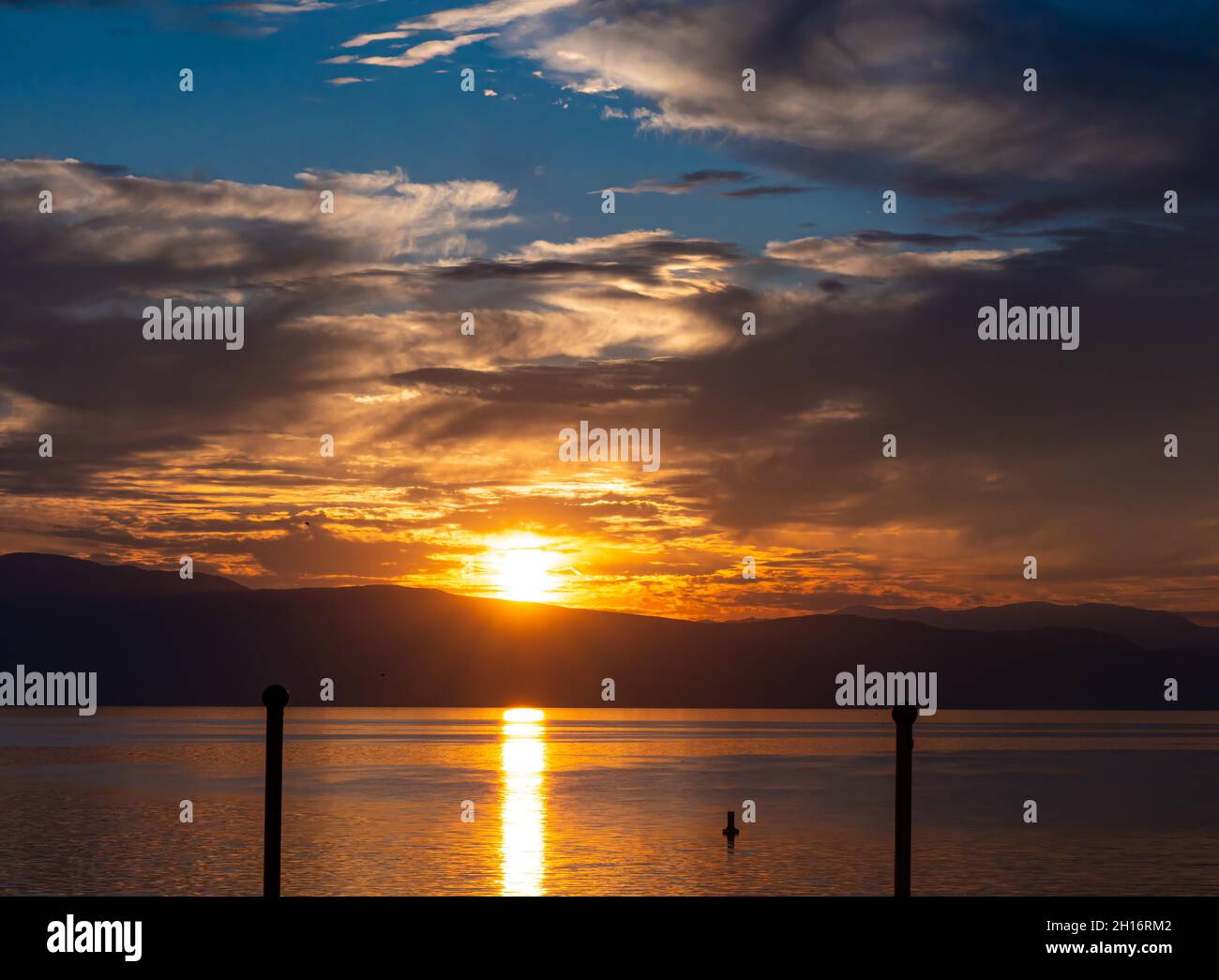 Beautiful calm lake with sunset, natural background Stock Photo - Alamy