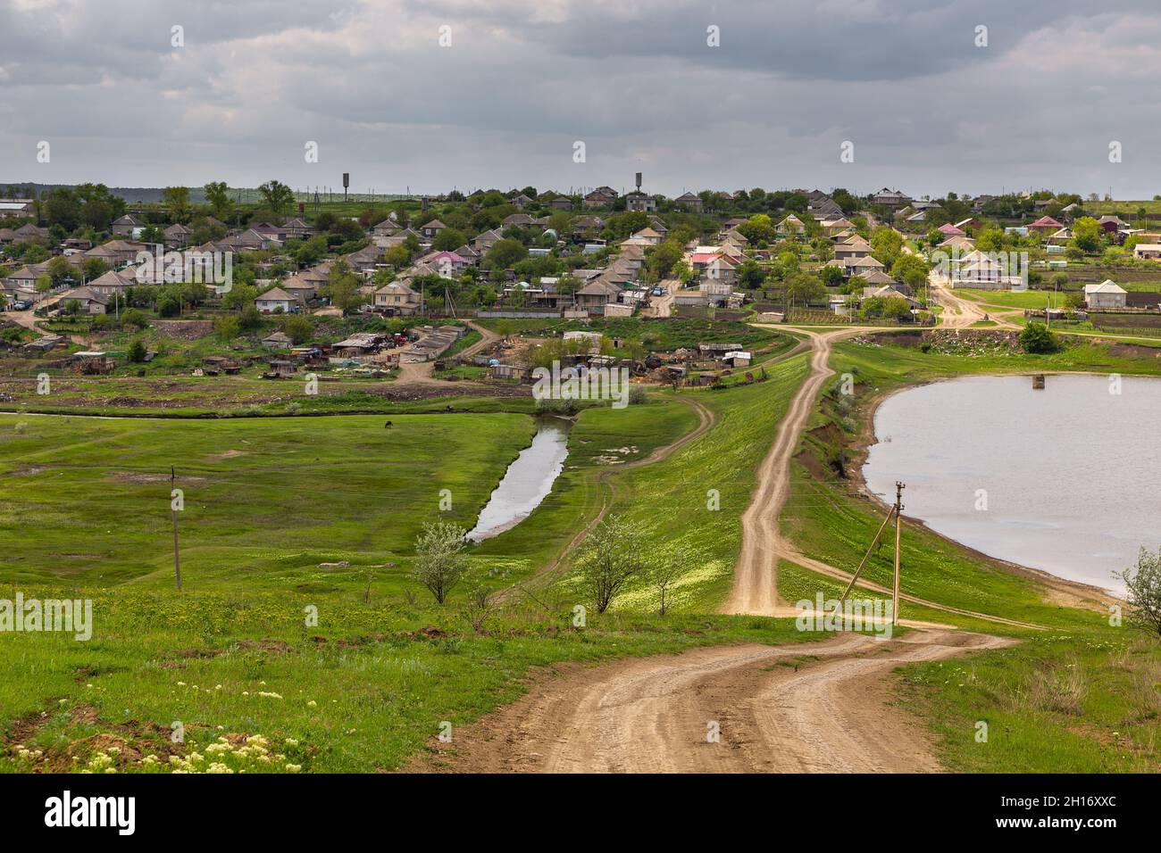 A view of a small Moldavian village. Rural landscape. Dezinghea ...