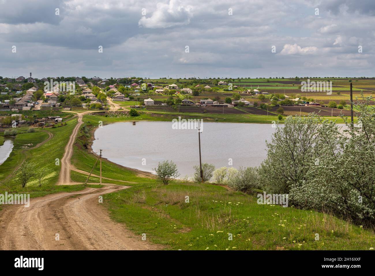 A view of a small Moldavian village. Rural landscape. Dezinghea ...