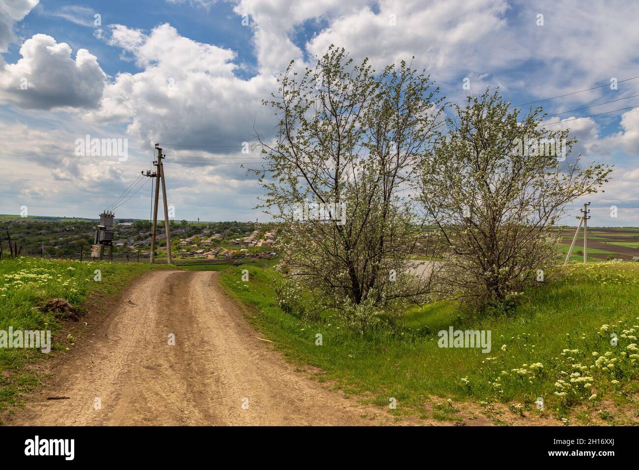 A view of a small Moldavian village. Rural landscape. Dezinghea ...