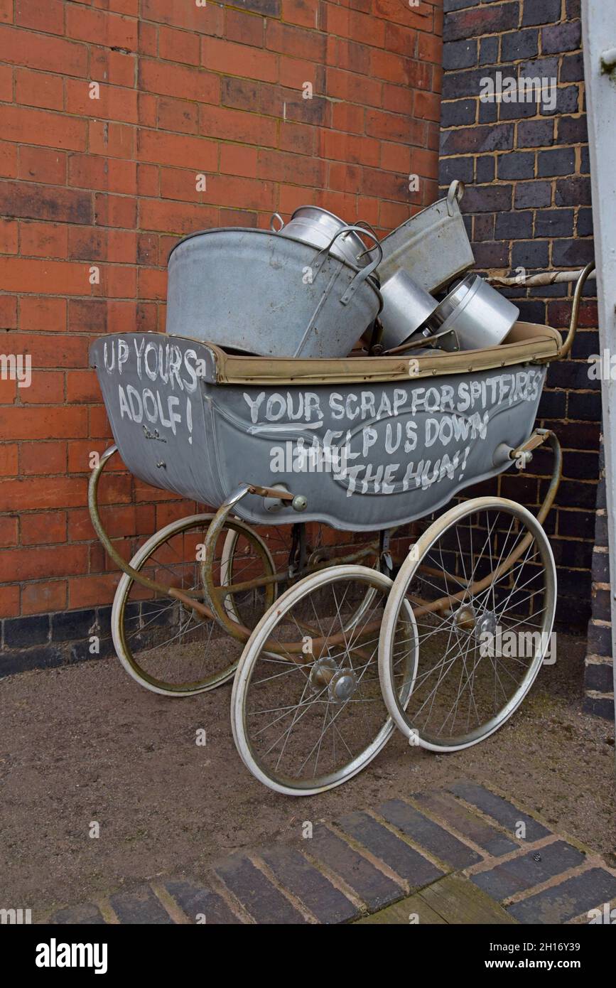 A World War 2 style prop pram full of saucepans for recycling into ...