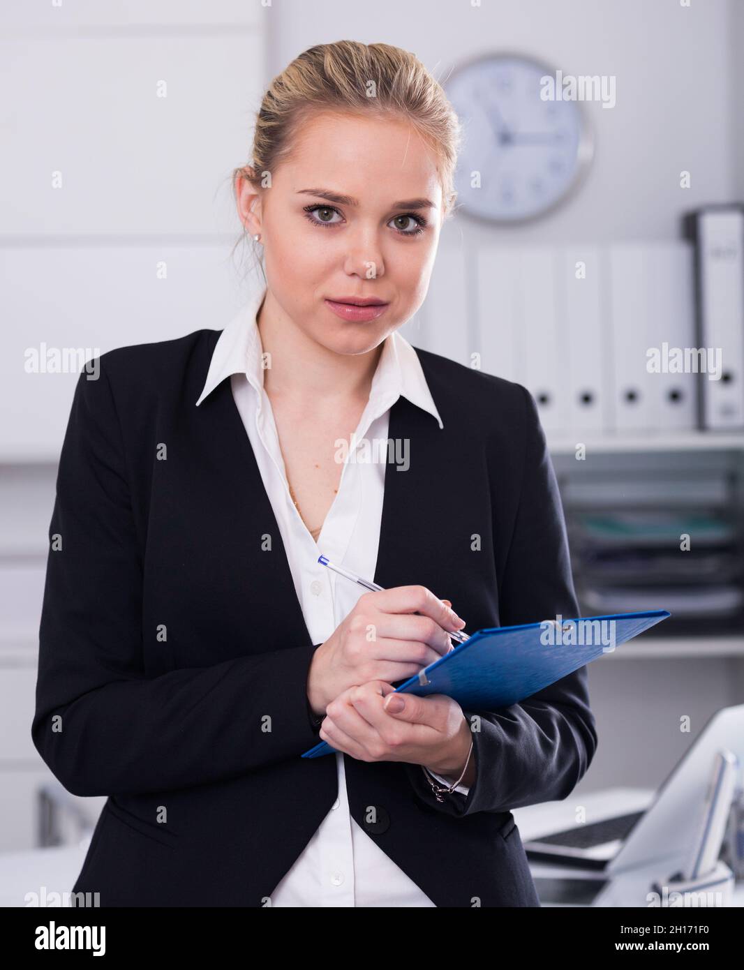 Secretary writing instructions Stock Photo - Alamy