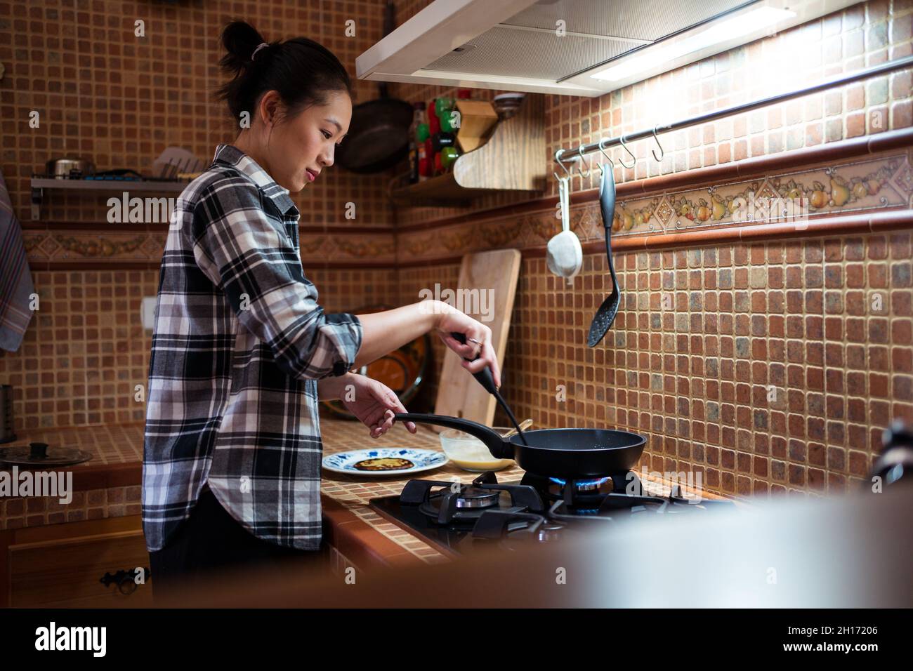 Asian female cook standing hi-res stock photography and images - Alamy