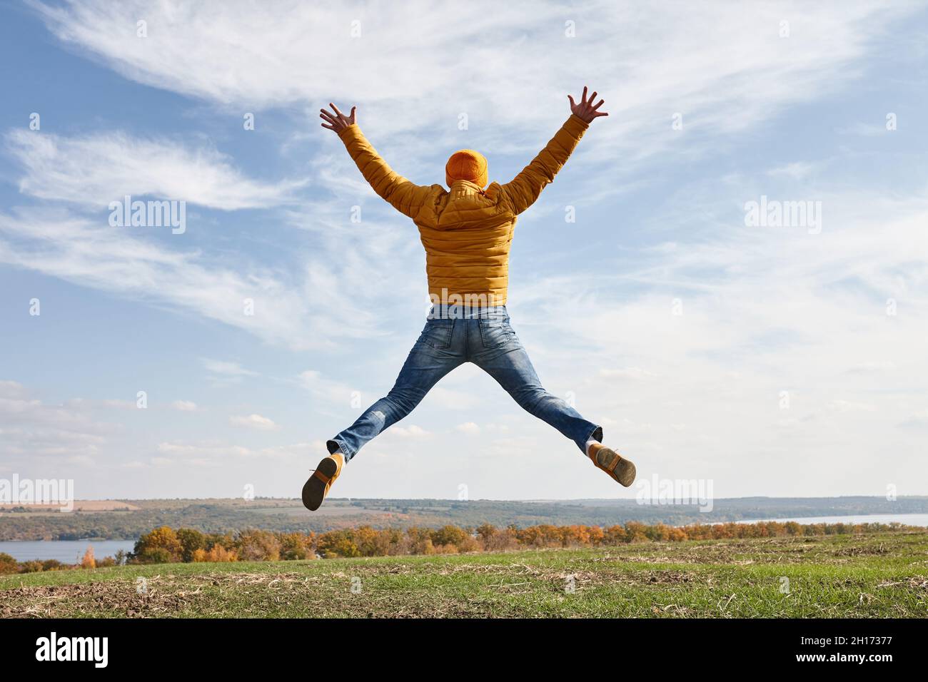 Man jump blue sky hi-res stock photography and images - Alamy