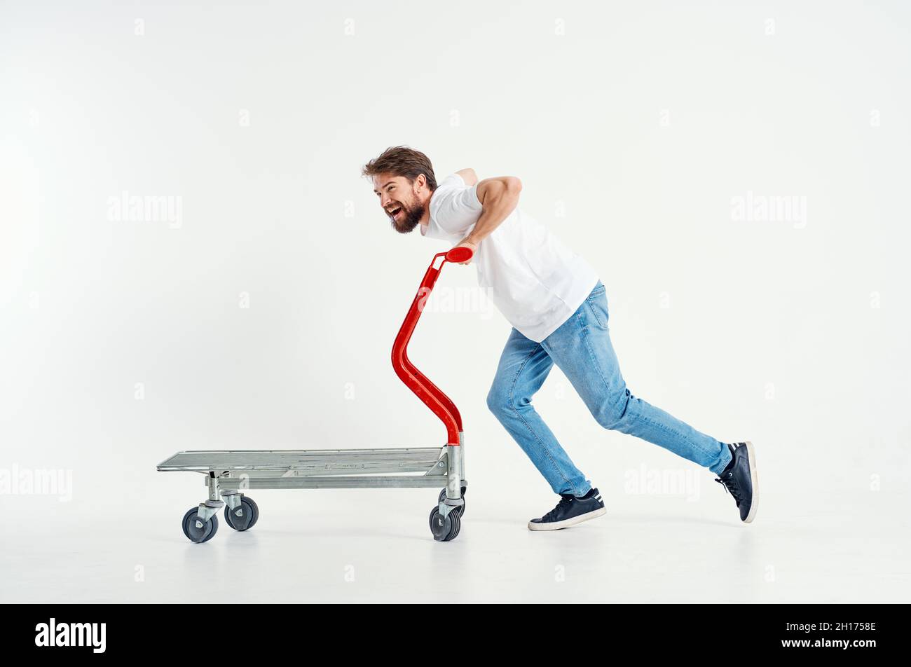 Man ride a cart entertainment shipping isolated background Stock Photo ...
