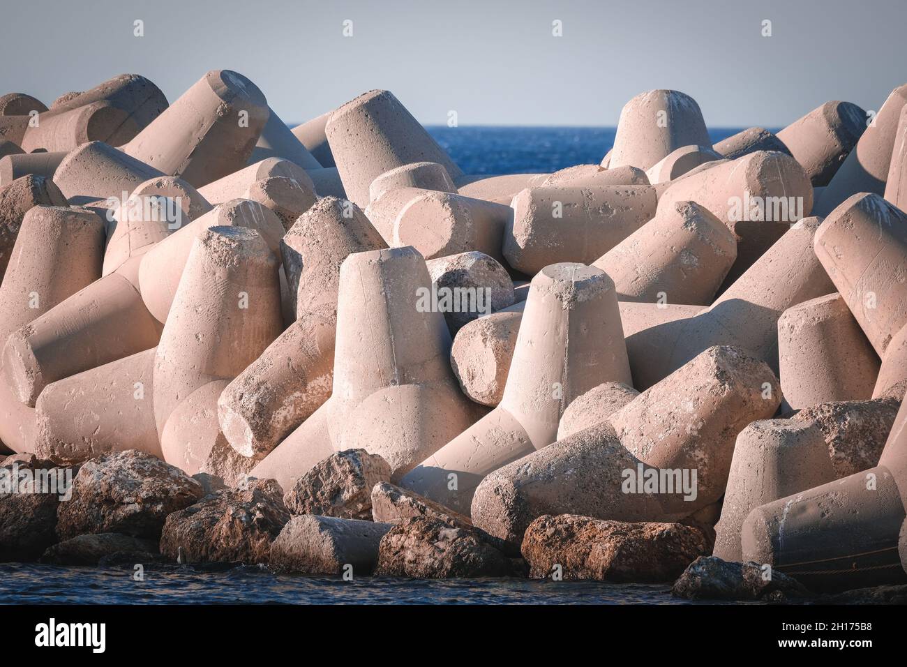 The stone tetrapods on the beach during the beach Stock Photo - Alamy