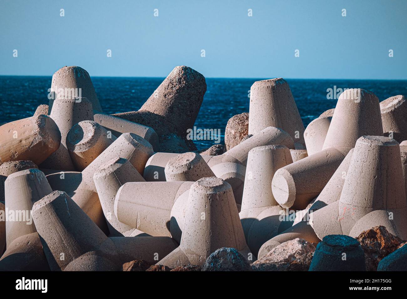 The stone tetrapods on the beach during the beach Stock Photo - Alamy