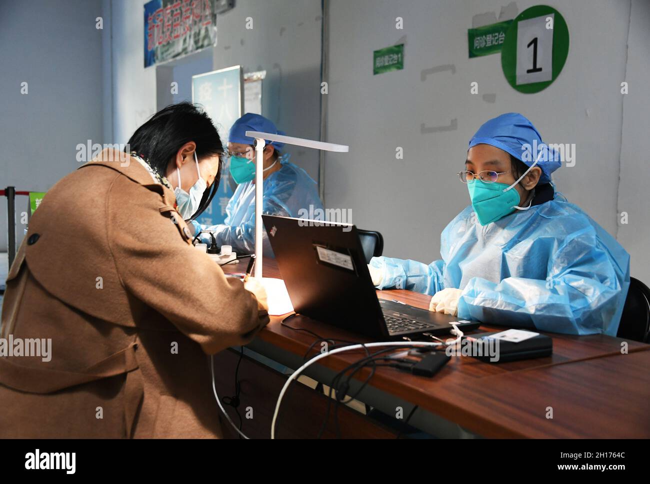 Woman getting a booster hi-res stock photography and images - Alamy