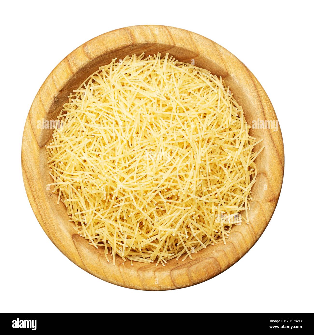 Filini raw pasta in wooden bowl isolated on white background. File ...