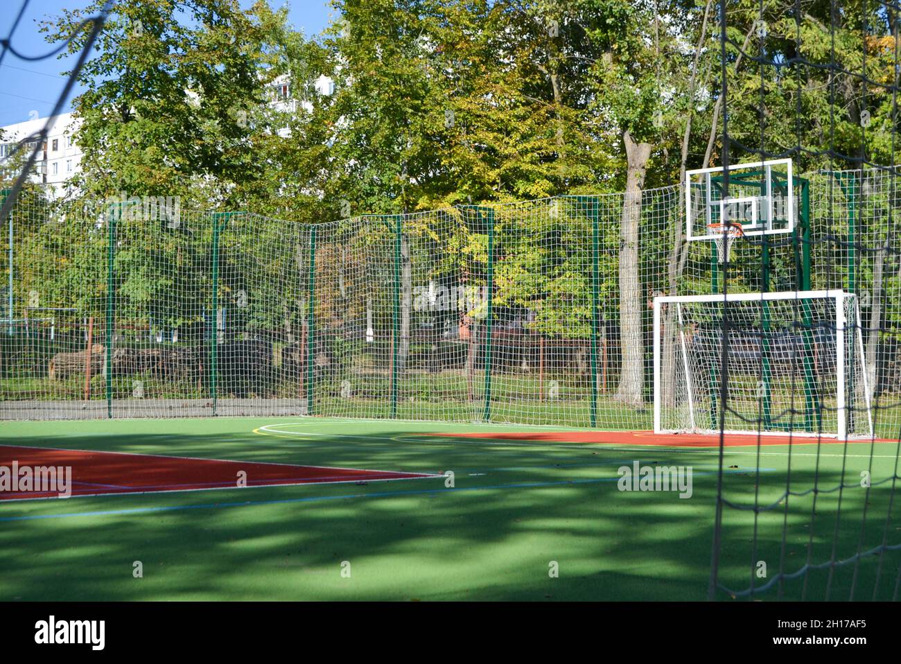 School soccer stadium. Empty soccer field behind the iron fence Stock ...