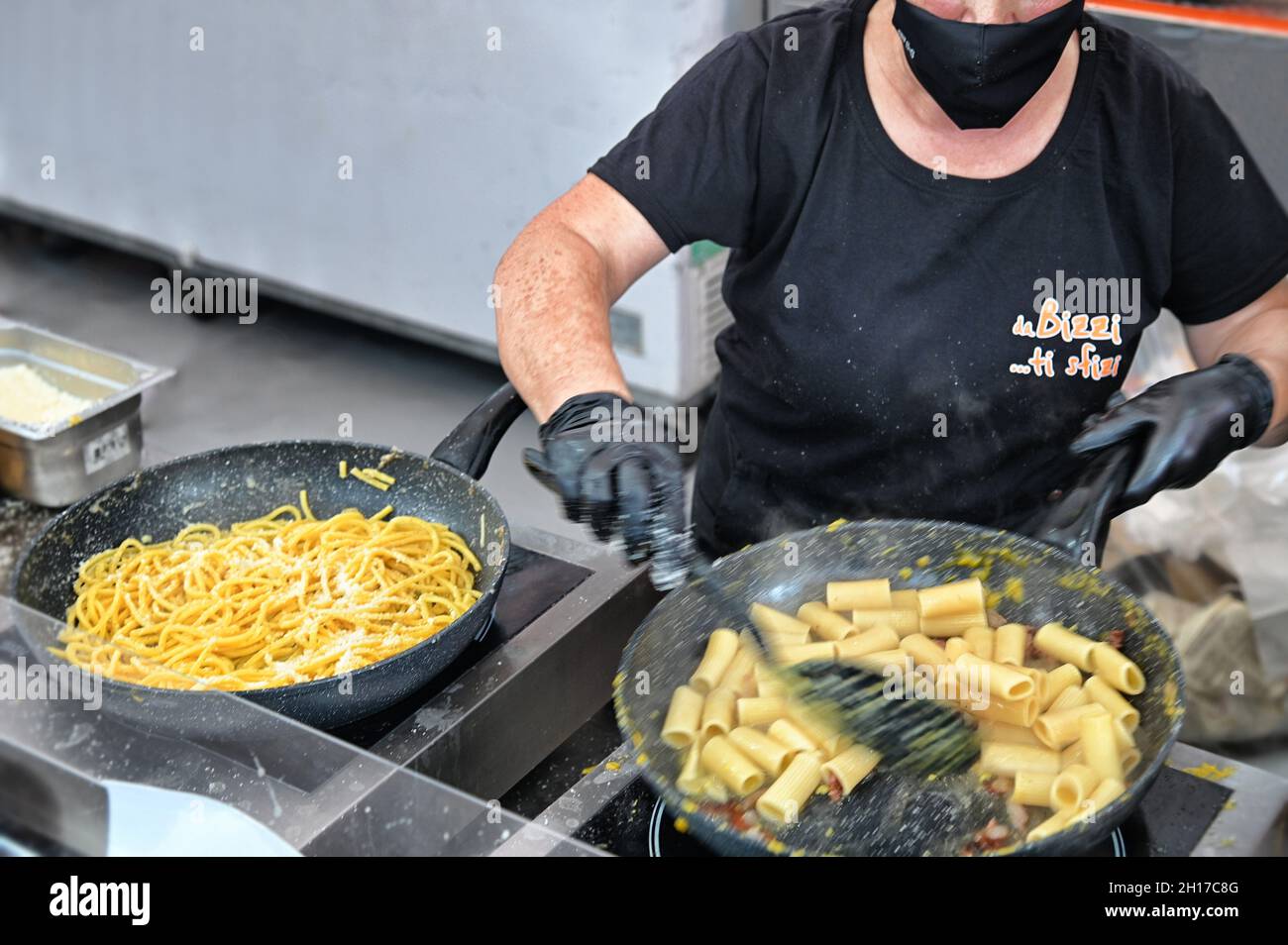 ROME, ITALY - Sep 21, 2021: A female cook making a typical Italian ...