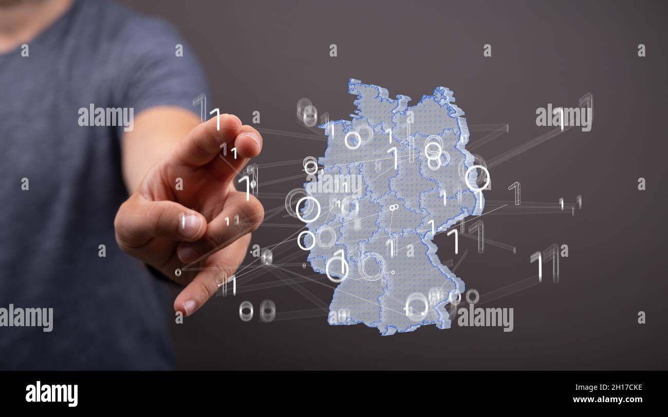 A close up of a man's fingers touching 3D render virtual Germany land ...