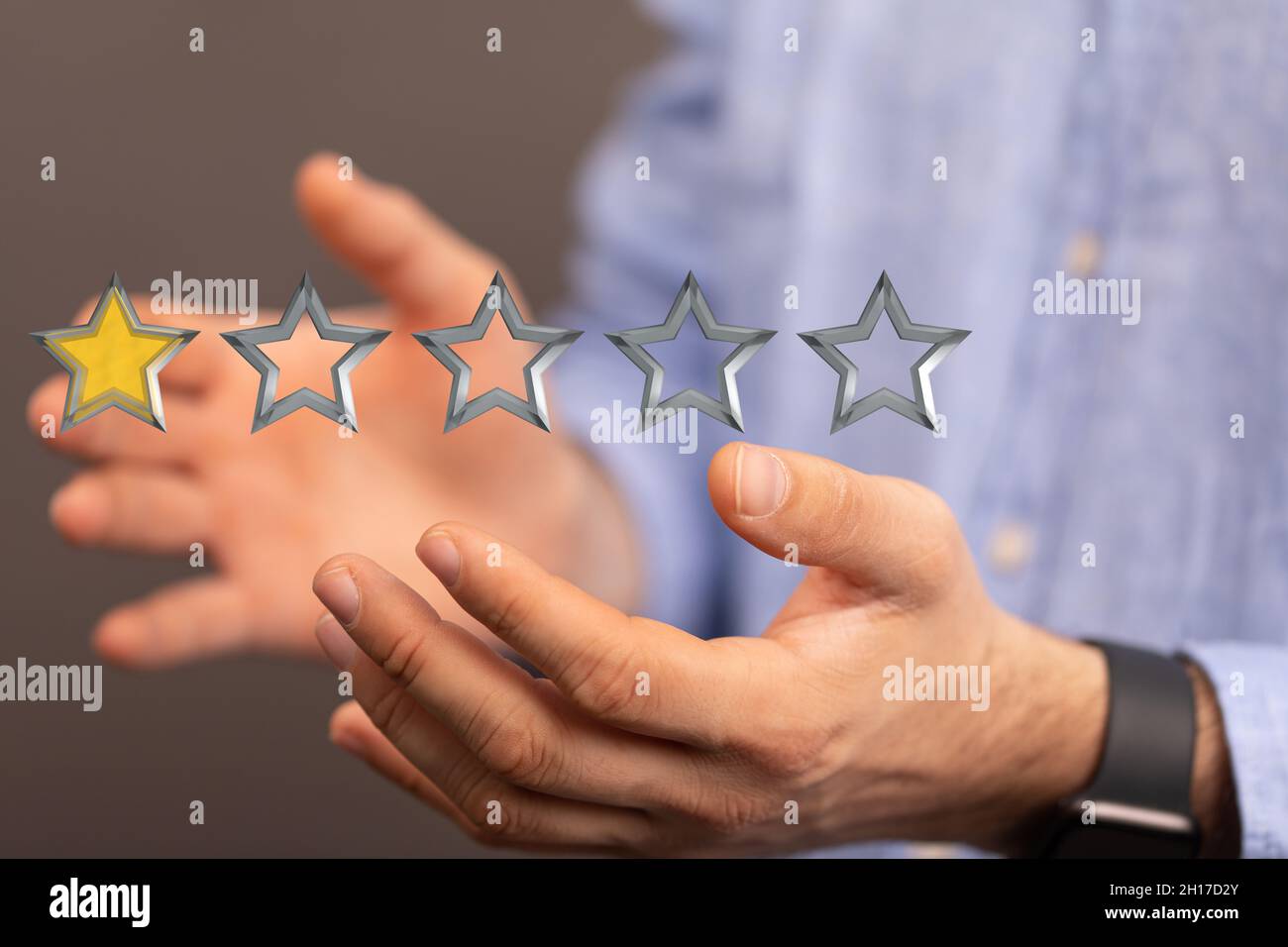 A person presenting a one-star rating - satisfaction concept Stock ...