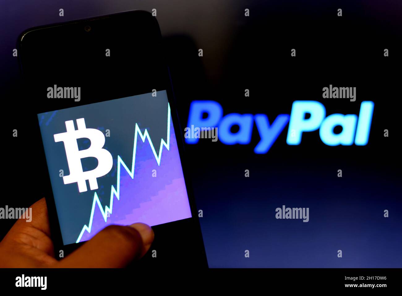 In this Photo illustration a Bitcoin logo seen displayed on a ...