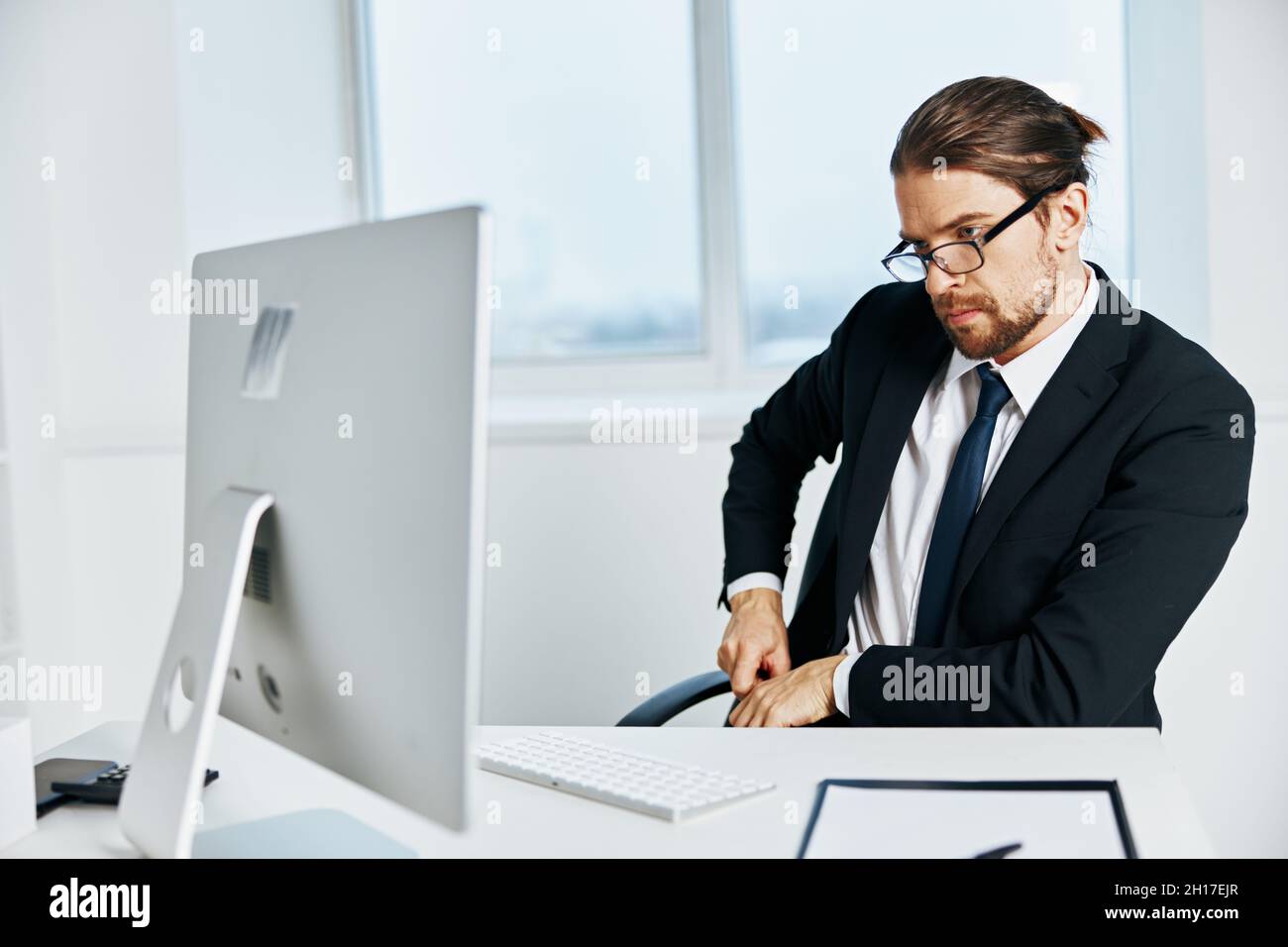 office worker near the desktop office computer Lifestyle Stock Photo ...