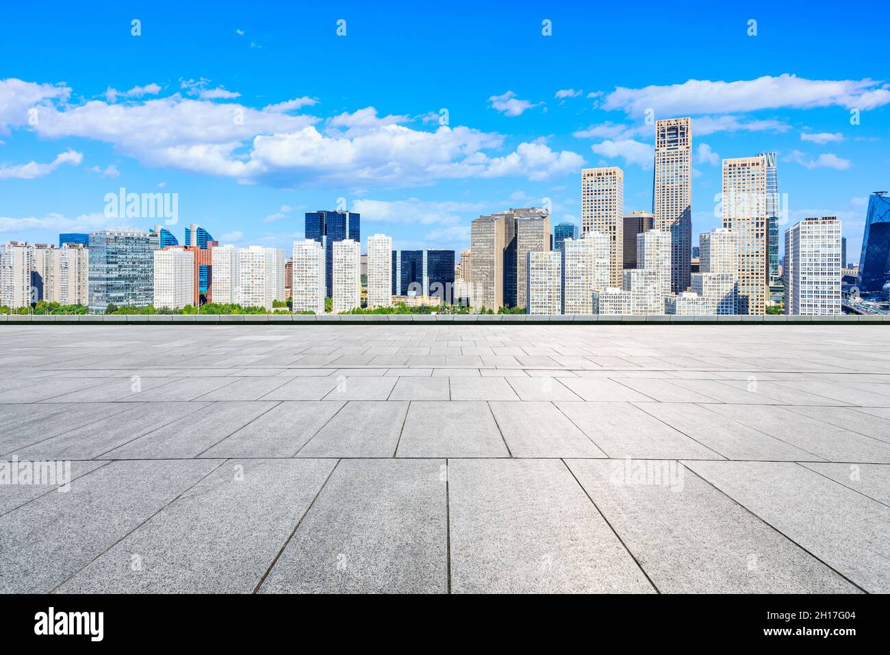 Empty square floor and modern city commercial buildings in Beijing ...