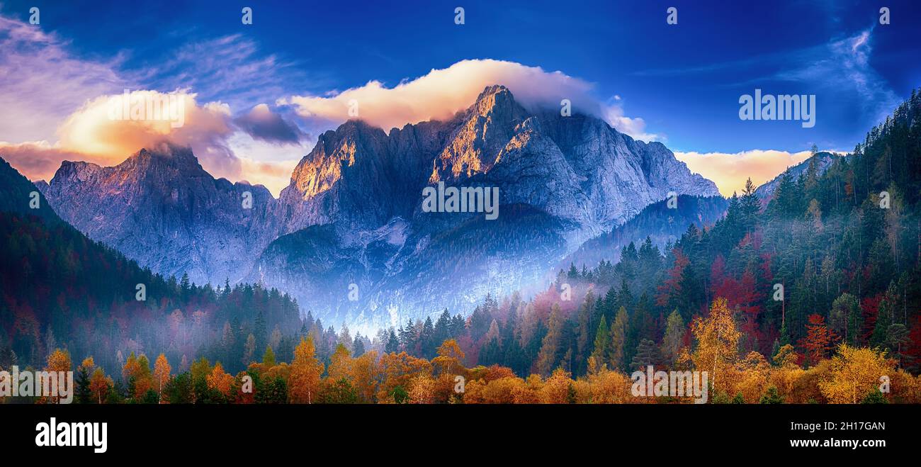 Triglav mountain peak at sunrise Stock Photo - Alamy