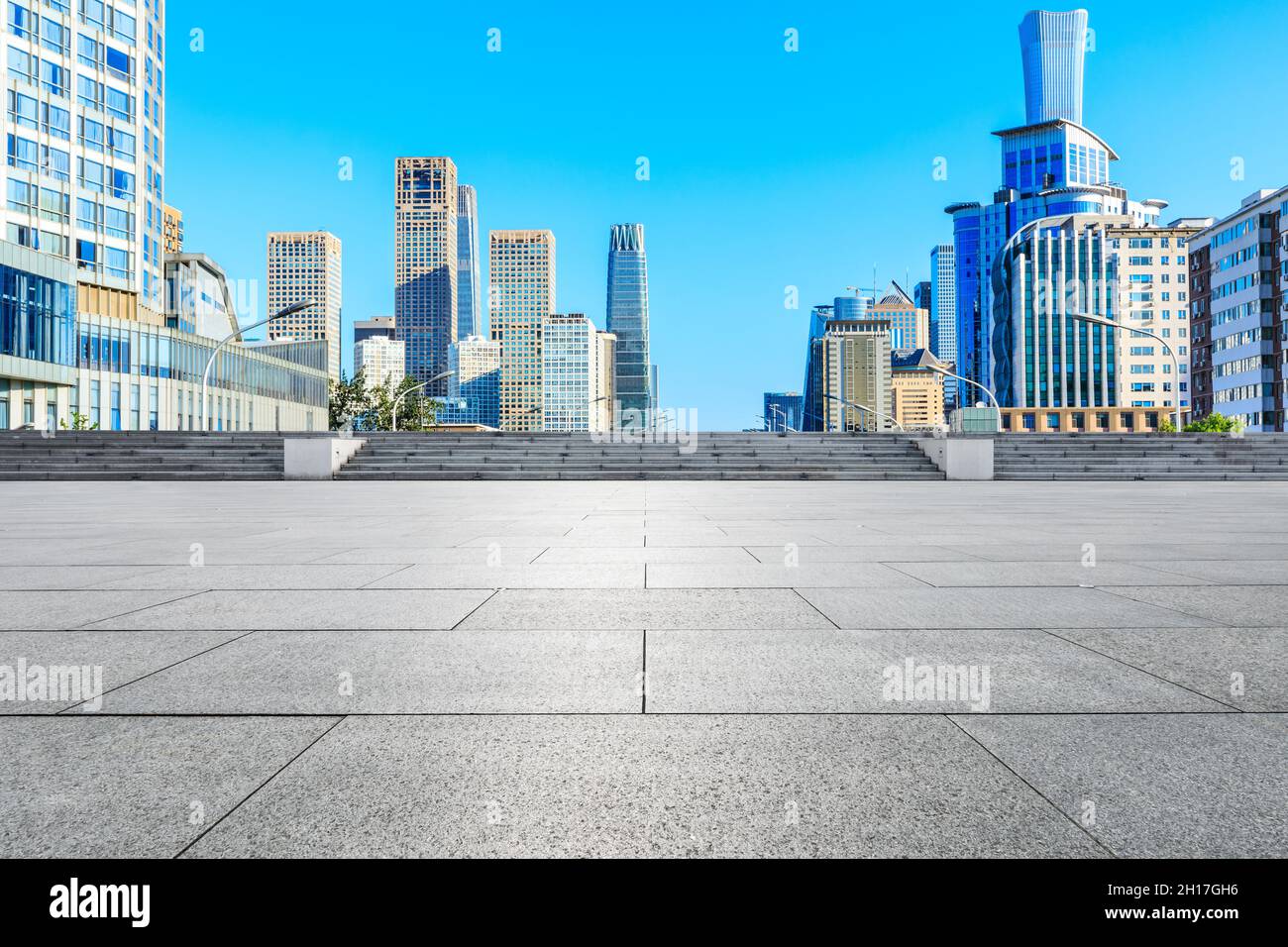 Empty square floor and modern city commercial buildings in Beijing ...