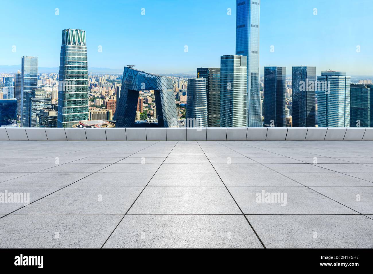 Empty square floor and modern city commercial buildings in Beijing ...
