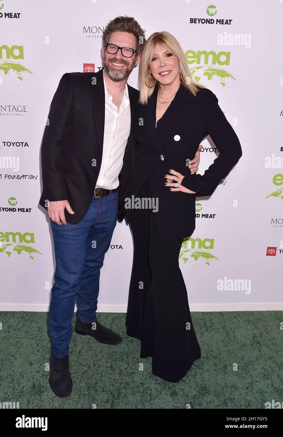 LOS ANGELES, CA - OCTOBER 16: K. Asher Levin (L) and Debbie Levin ...