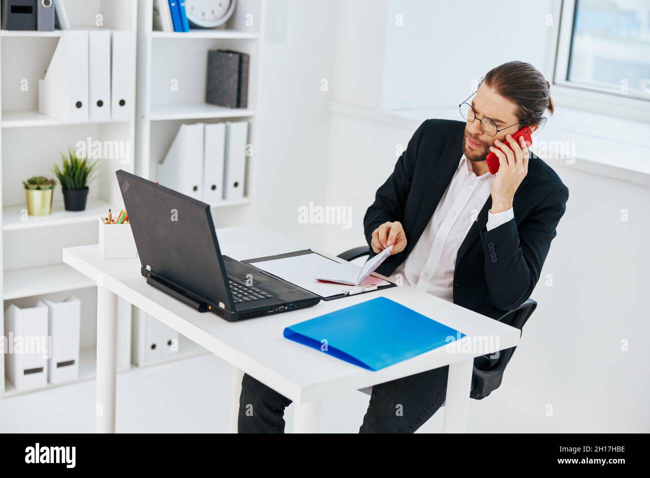 manager documents work office laptop technologies Stock Photo - Alamy