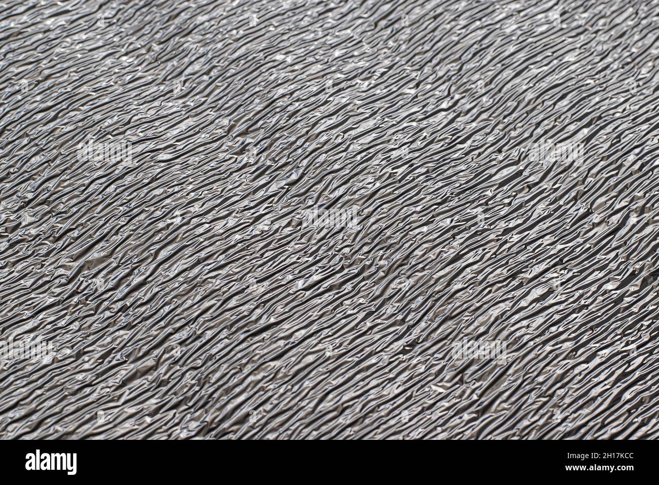 Surface texture of reflective metallic insulation material Stock Photo ...