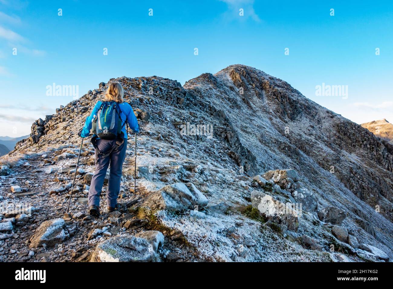 A walker pushes on to the summit of Munro mountain of Stob Dubh on the ...