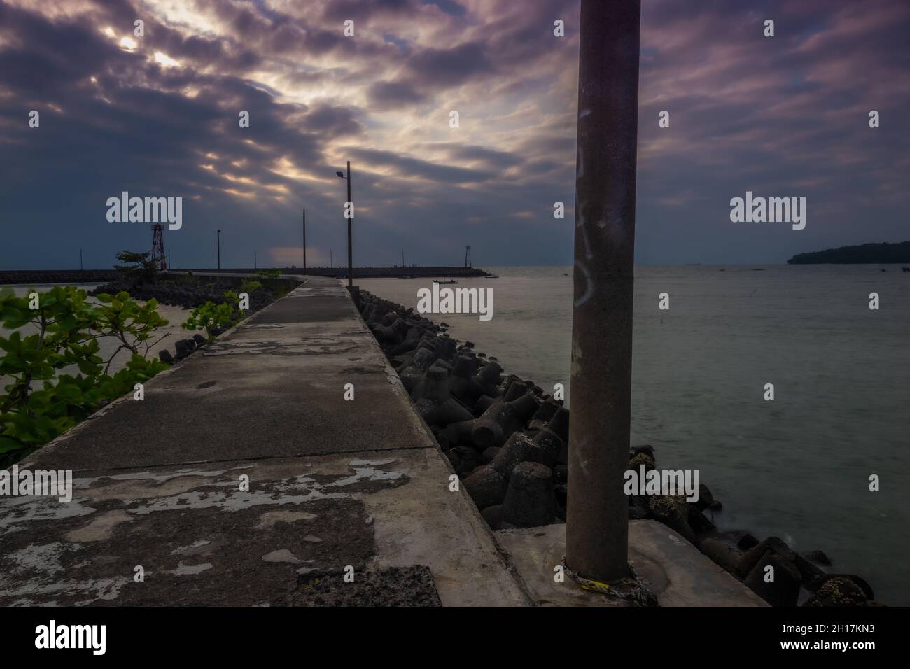 pier by the beach in the morning with a wide ocean view Stock Photo - Alamy