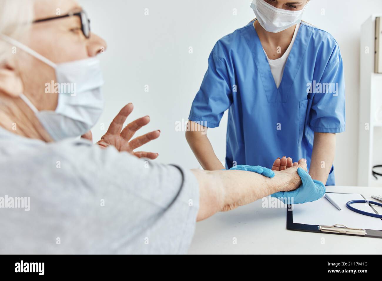nurse and patient professional examination health care Stock Photo - Alamy