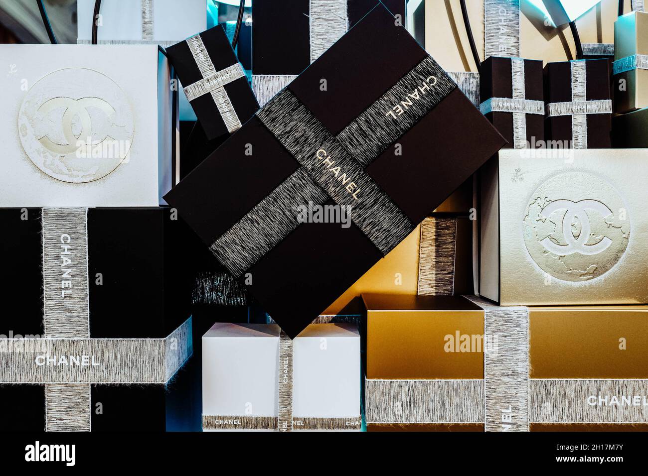 Chanel Gold and Black Gift Boxes with ribbons. New Year's festive ...