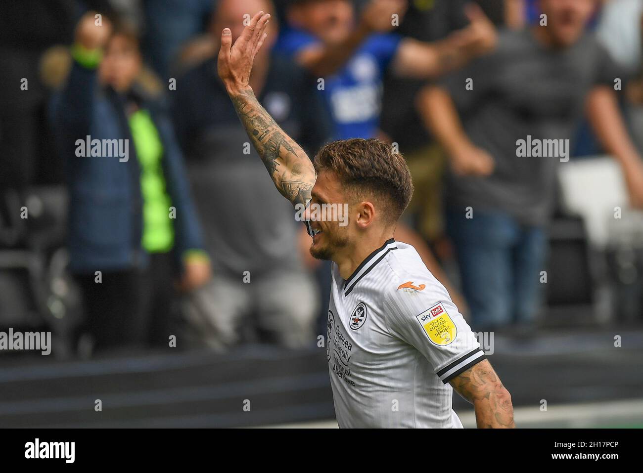 Jamie Paterson #12 of Swansea City celebrates his goal to make it 1-0 ...