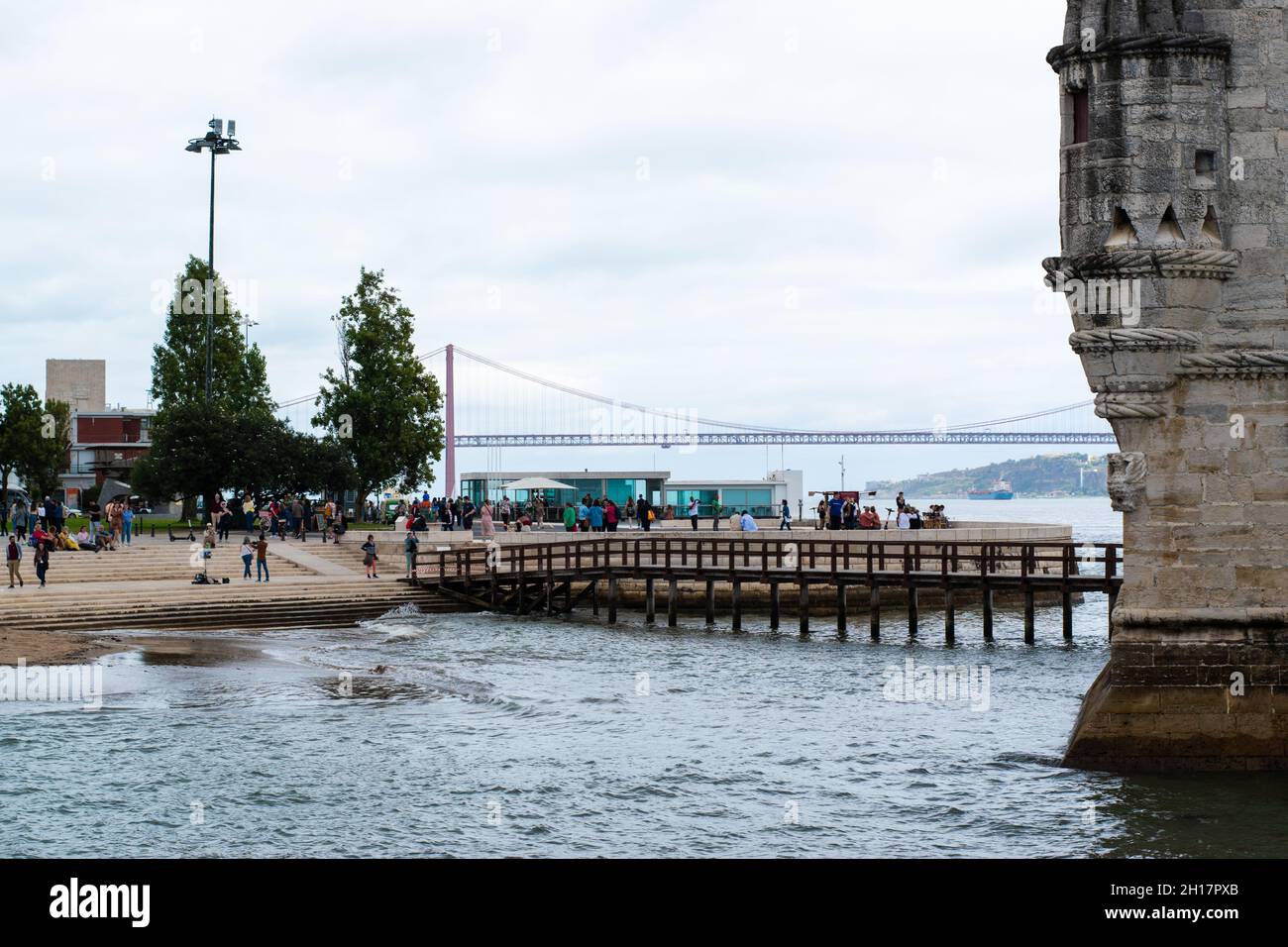 old castle with red bridge behind Stock Photo - Alamy