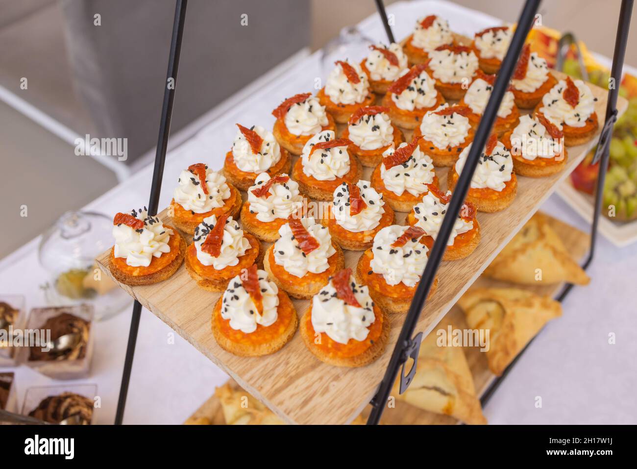 Different types of canapes on buffet table Stock Photo - Alamy