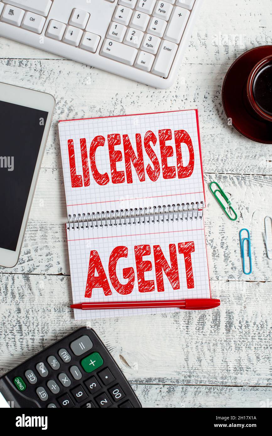 Hand writing sign Licensed Agent. Internet Concept Authorized and ...