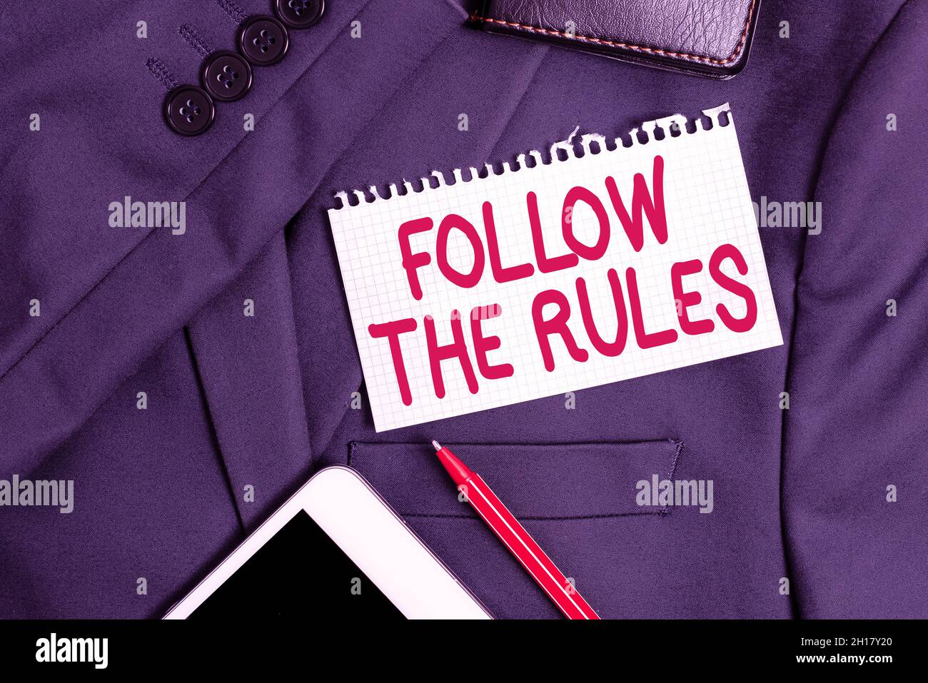 Hand writing sign Follow The Rules. Word Written on go with regulations ...