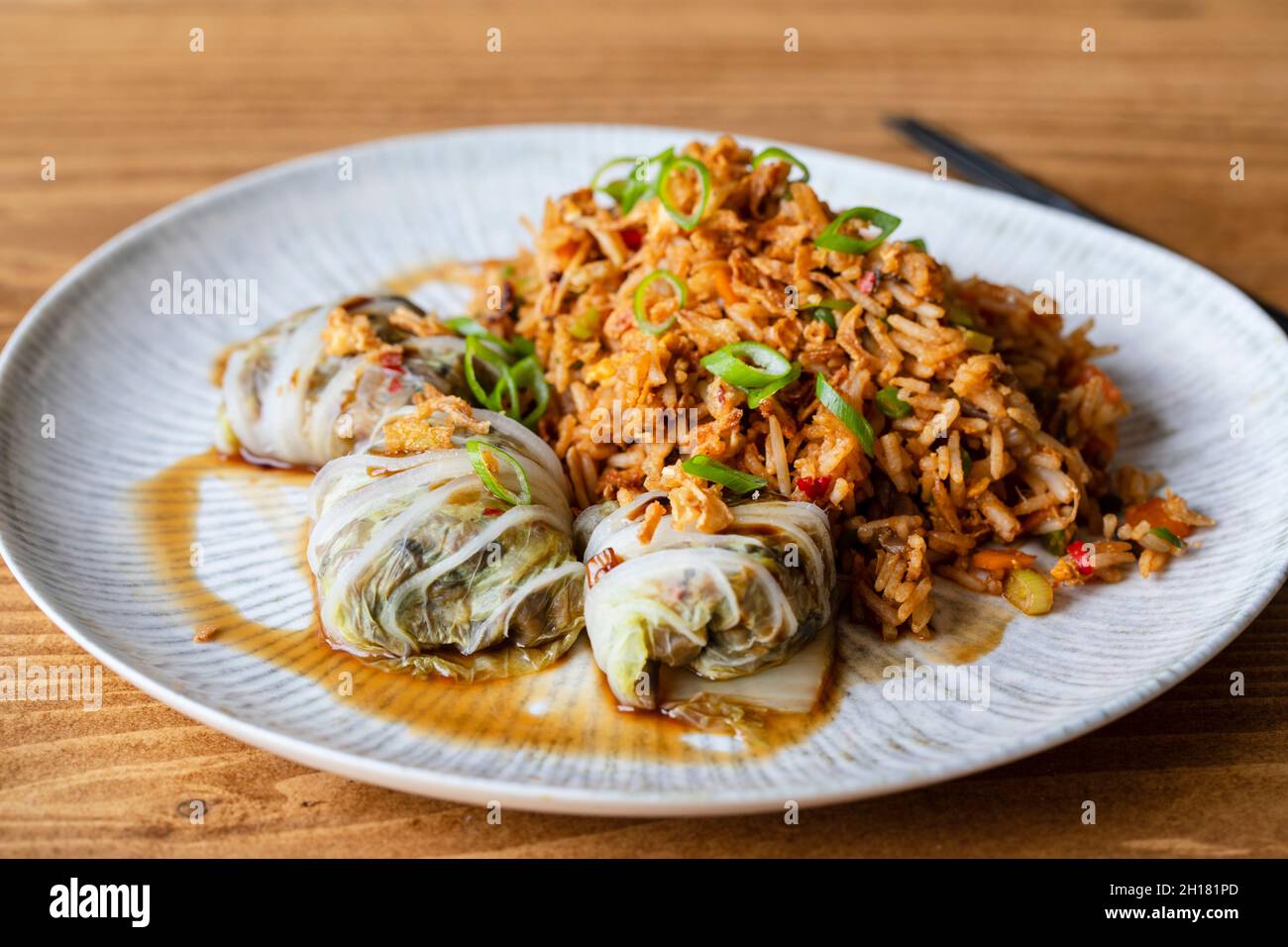 Chinese leaf parcels with mushroom filling in oyster sauce with nasi ...