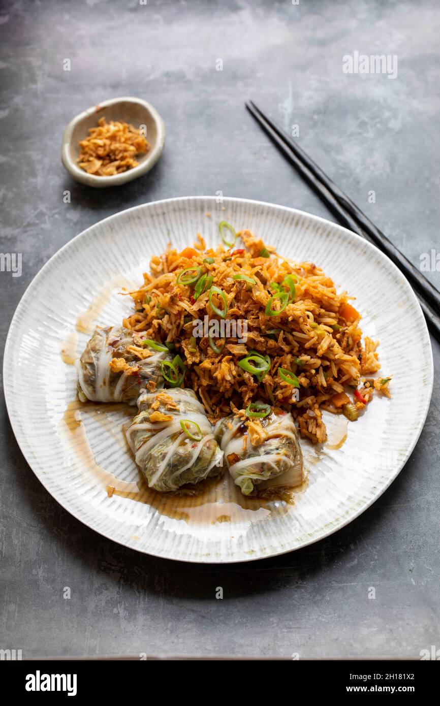 Chinese leaf parcels with mushroom filling in oyster sauce with nasi ...
